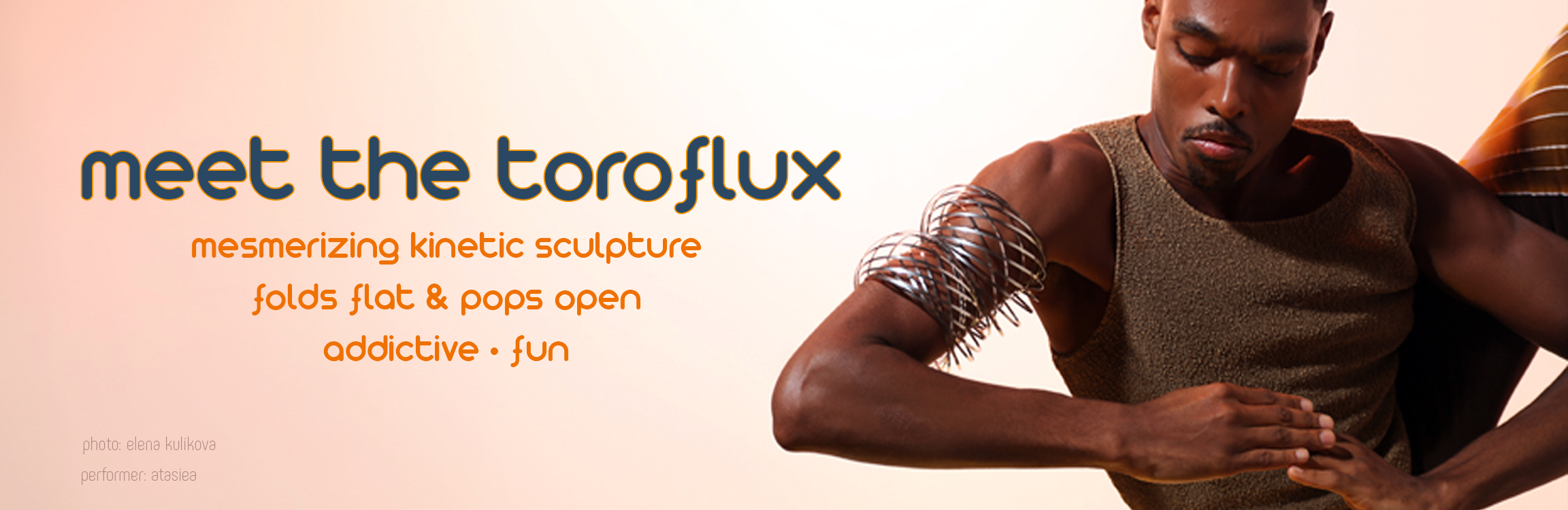 the original toroflux® kinetic arm slinky toy - flowtoys