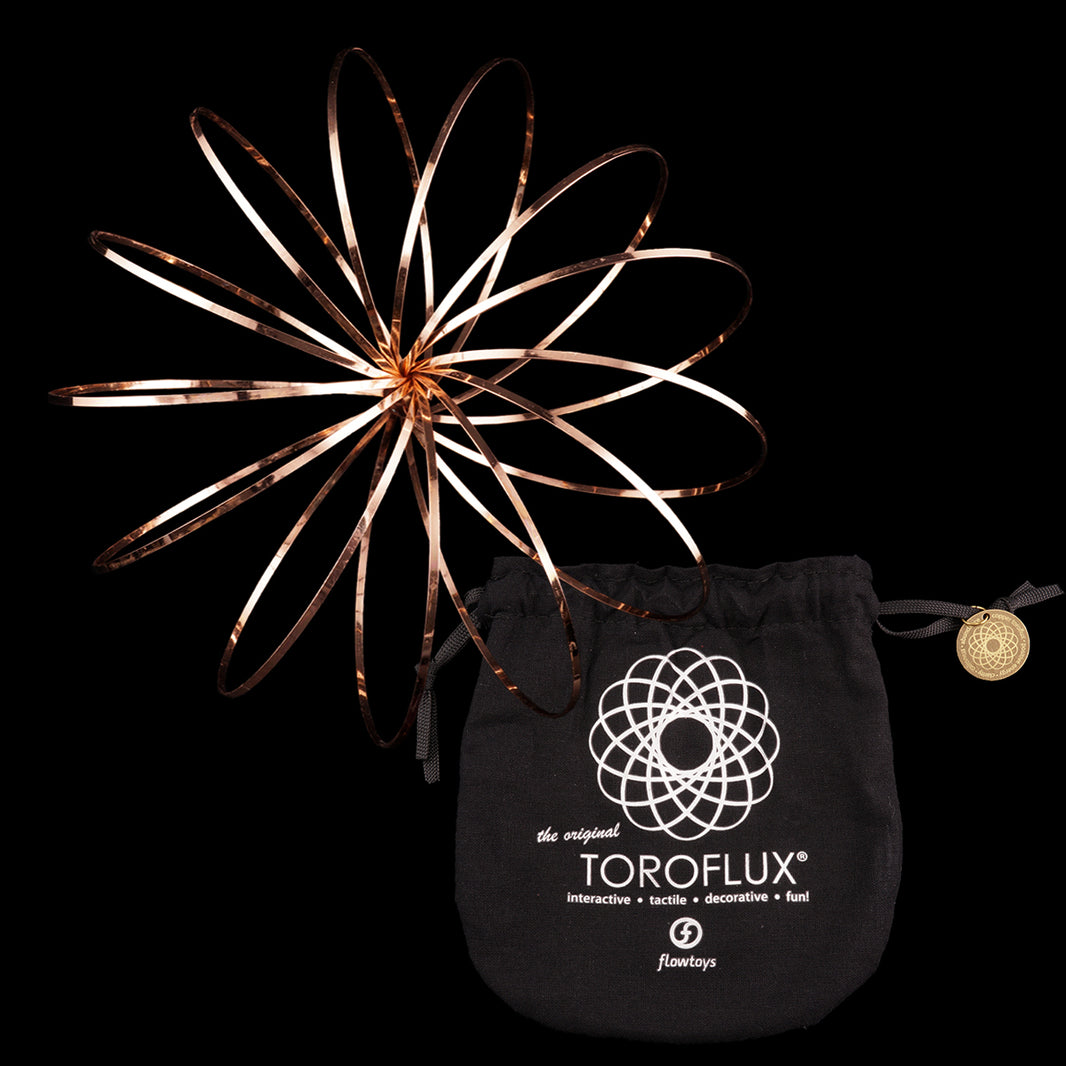 the original toroflux® kinetic arm slinky toy - flowtoys