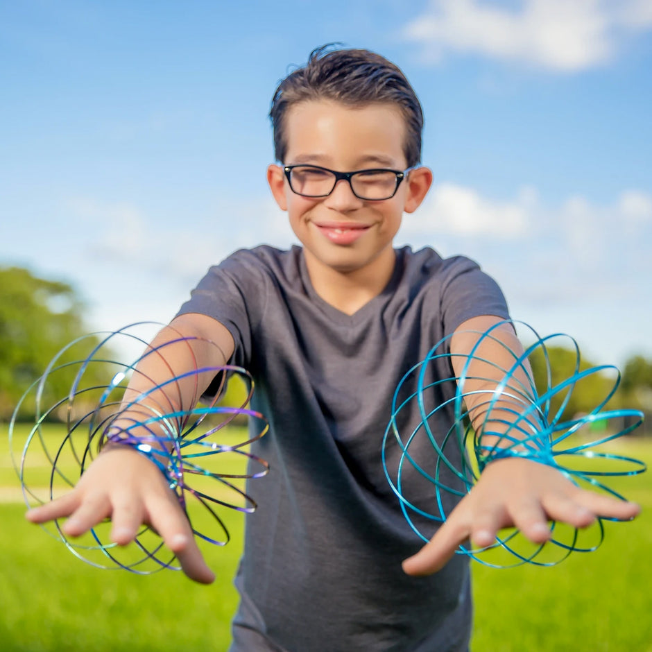 the original toroflux® kinetic arm slinky toy - flowtoys